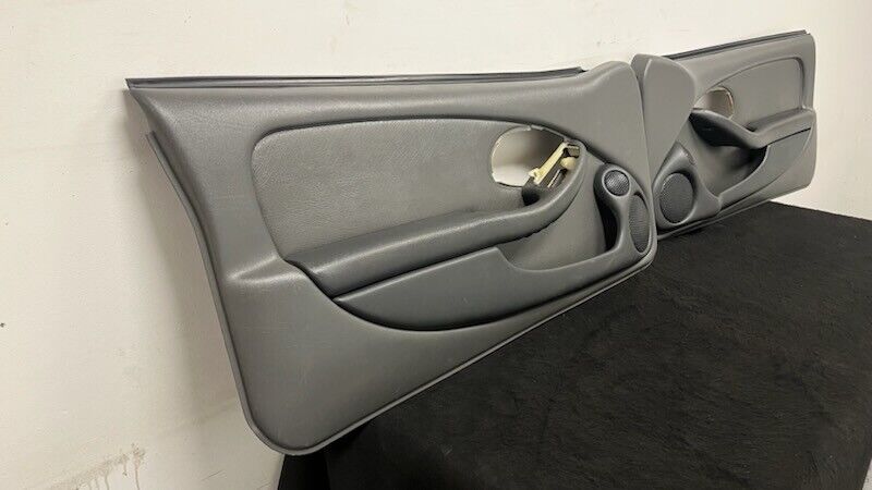 93 02 Firebird Trans Am Gray Driver Passenger Leather Door Panels OEM Olmsted Automotive